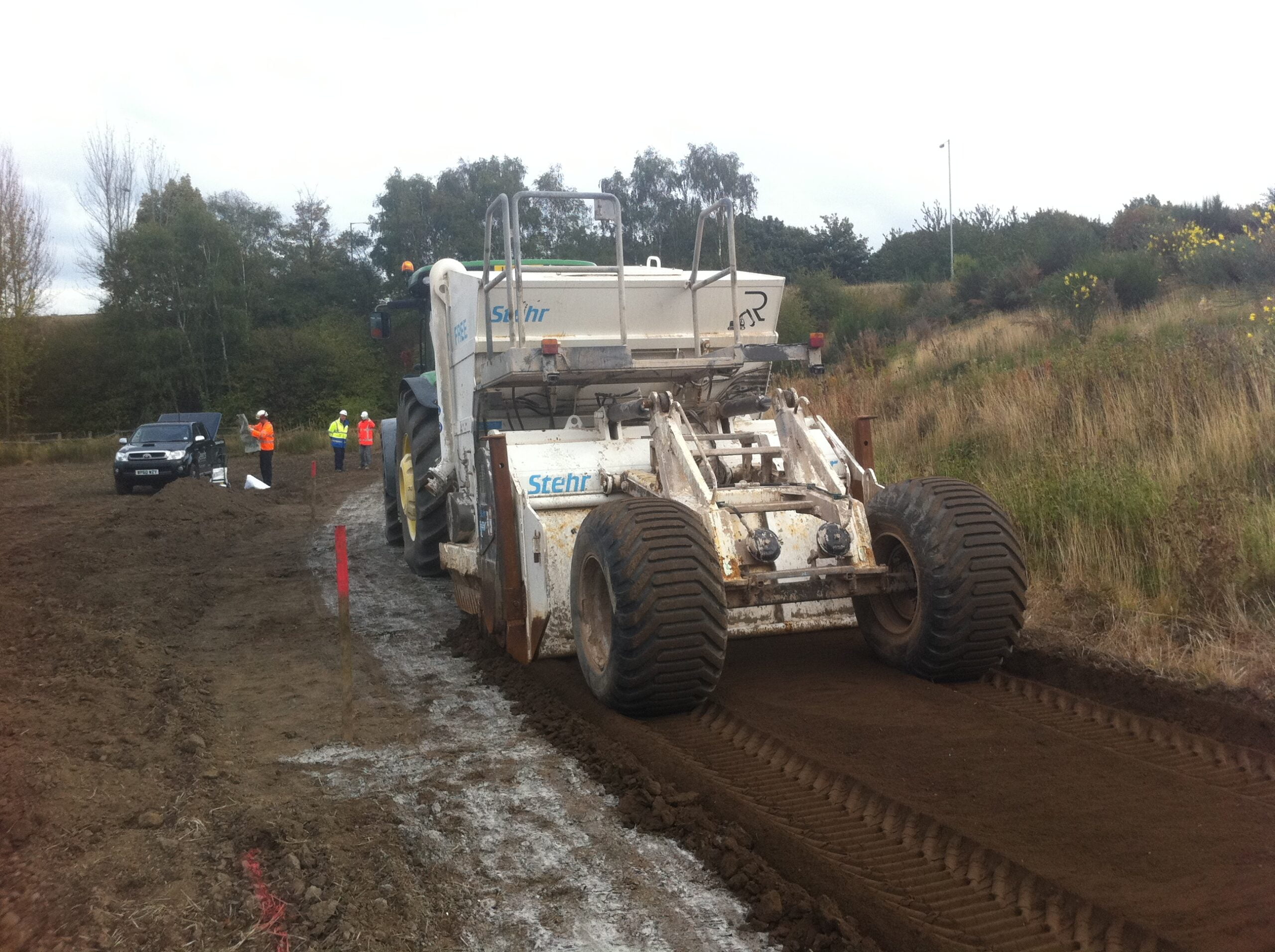 What is the best way to construct a temporary access road?